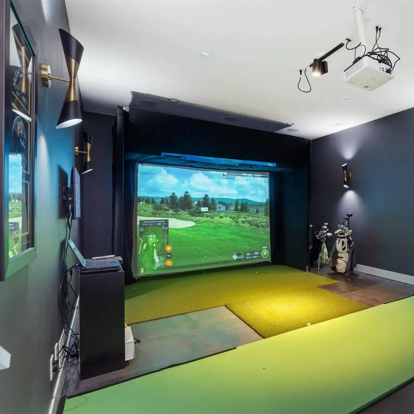 modern home golf simulator in basement in North America